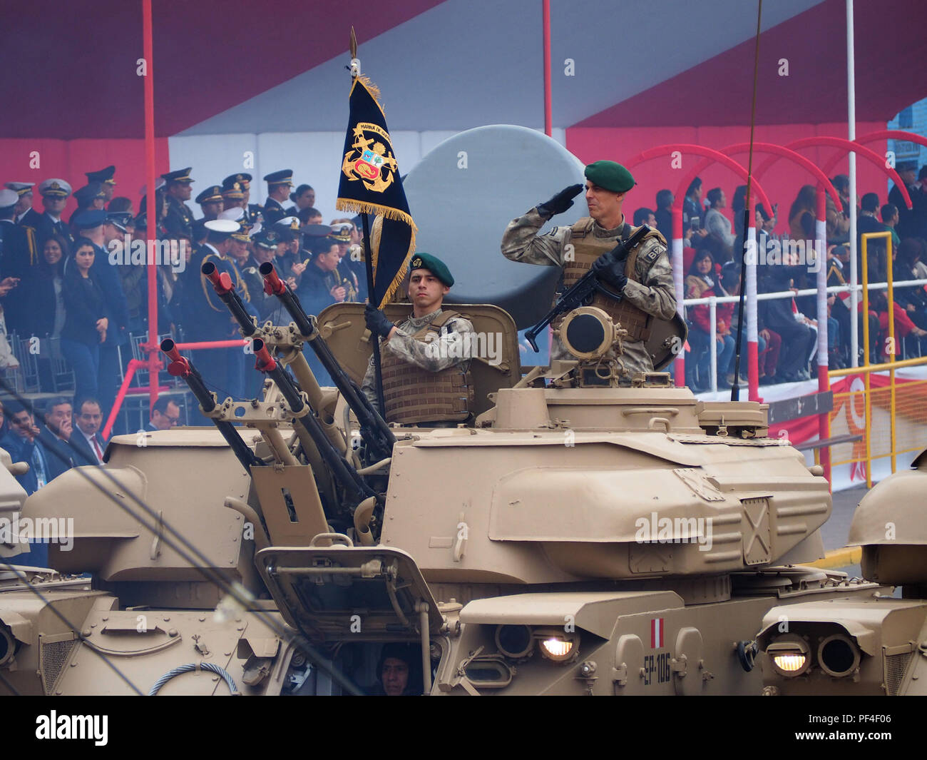 Peruvian soldiers saludating on board of the ZSU-23-4 "Shilka", a ...