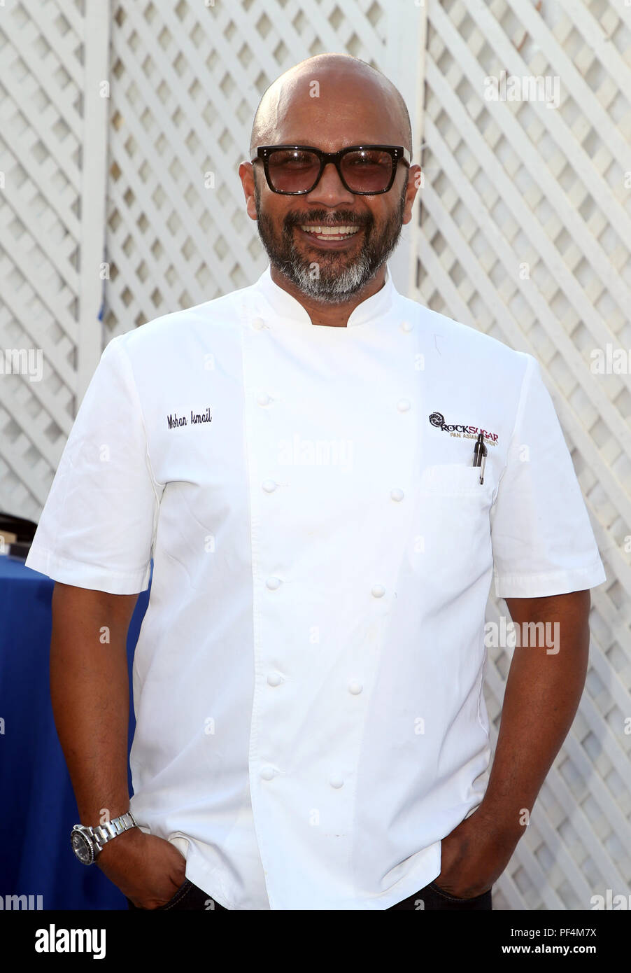 Los Angeles, Ca, USA. 18th Aug, 2018. Chef Mohan, Mohan Ismail, attends ...