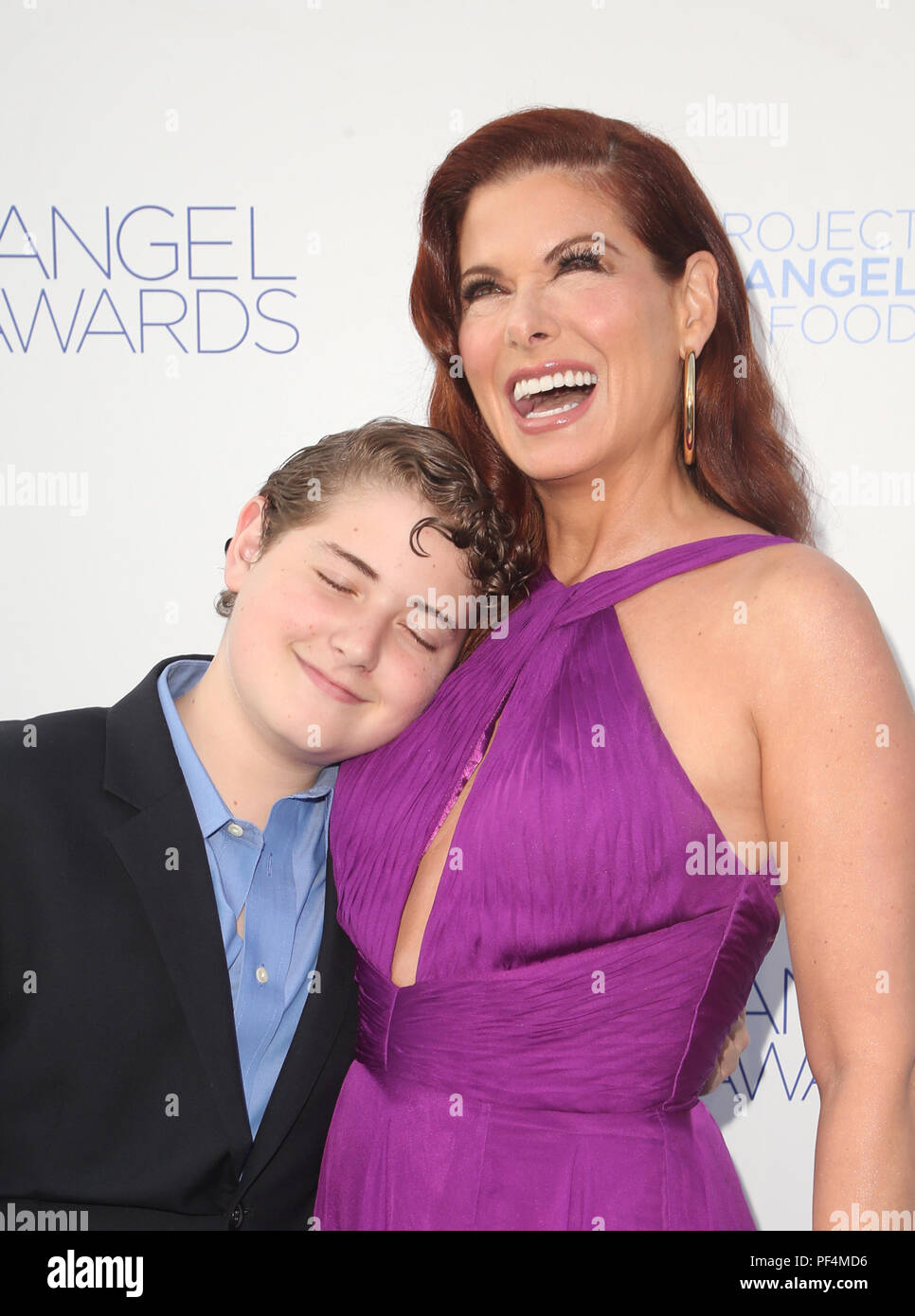 Los Angeles, Ca, USA. 18th Aug, 2018. Debra Messing, Roman Walker ...
