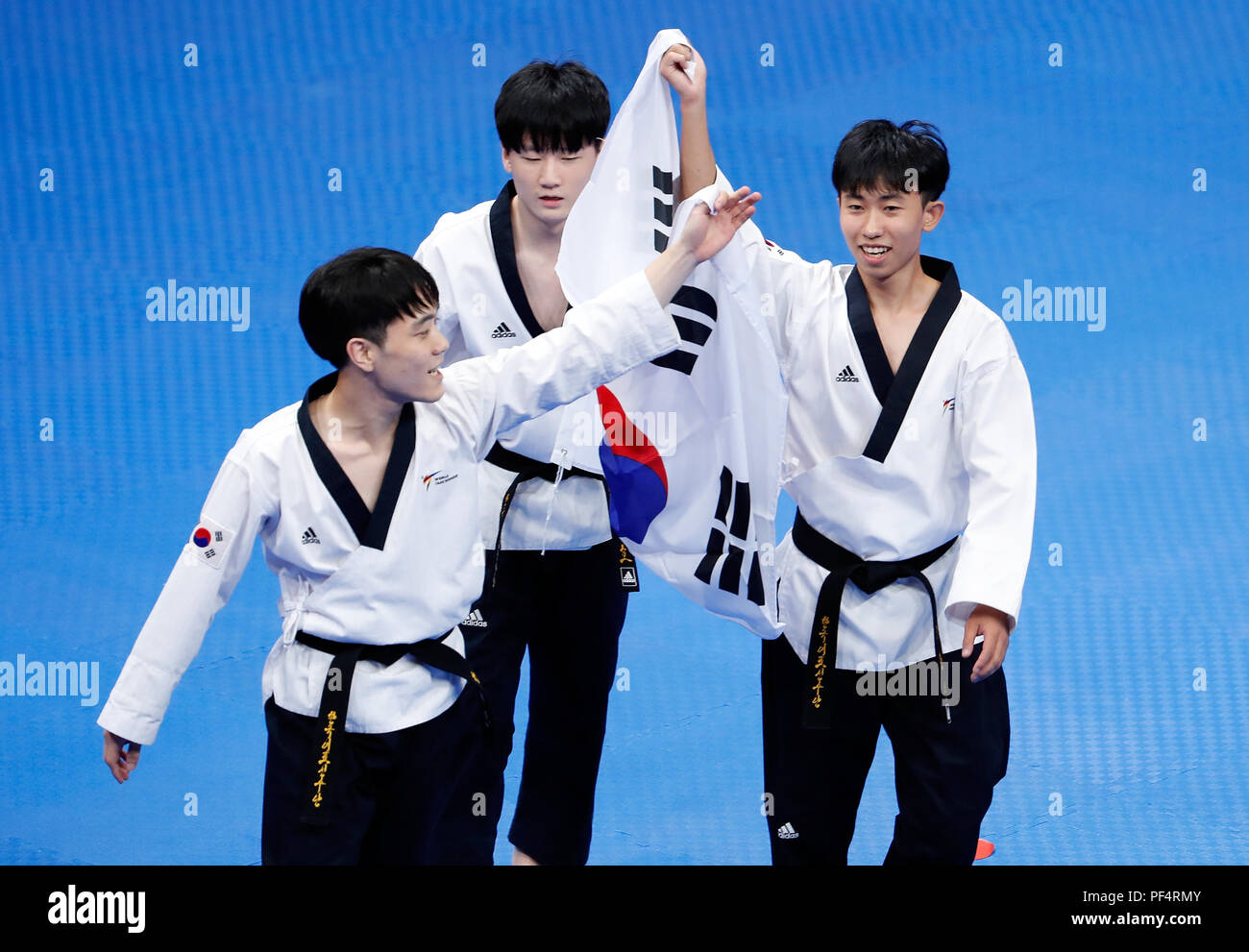 Jakarta. 19th Aug, 2018. Han Yeonghun(L) of South Korea celebrates with ...