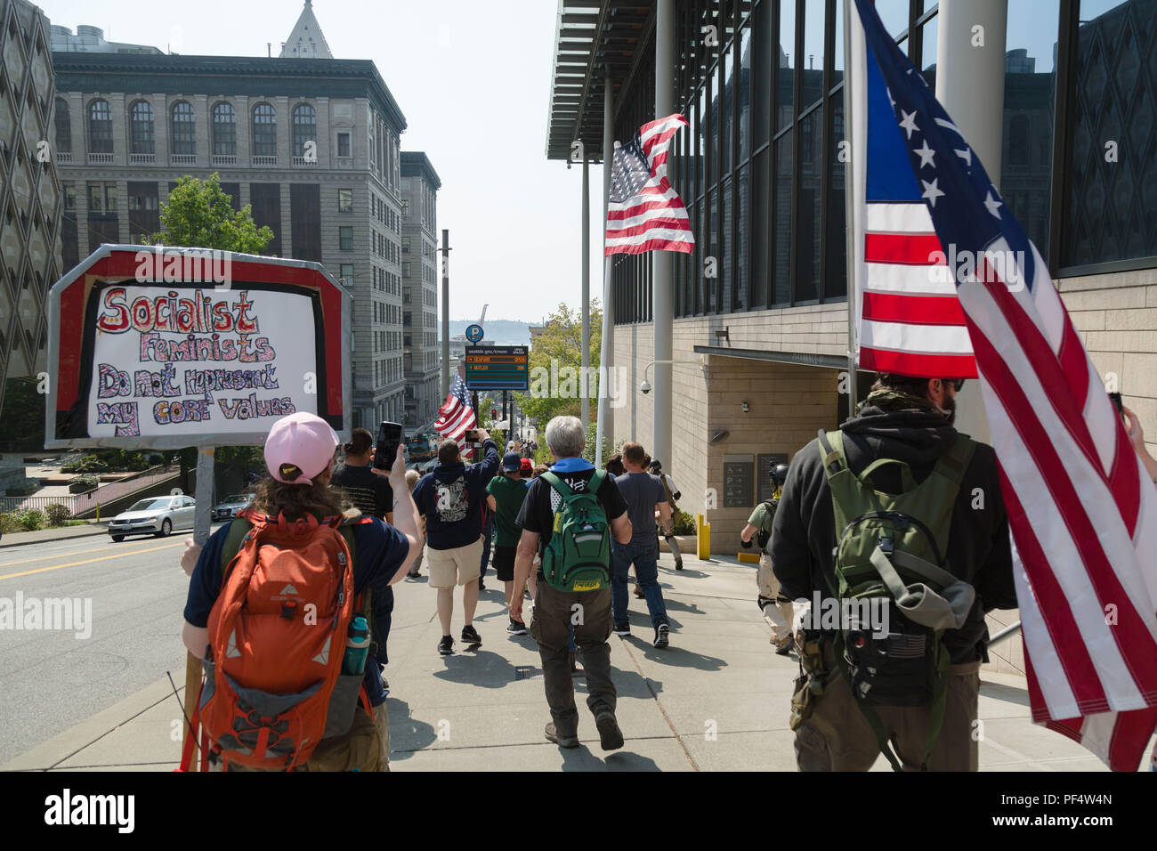 Seattle, WA, USA. 18th August, 2018. The pro gun supporters march aound ...