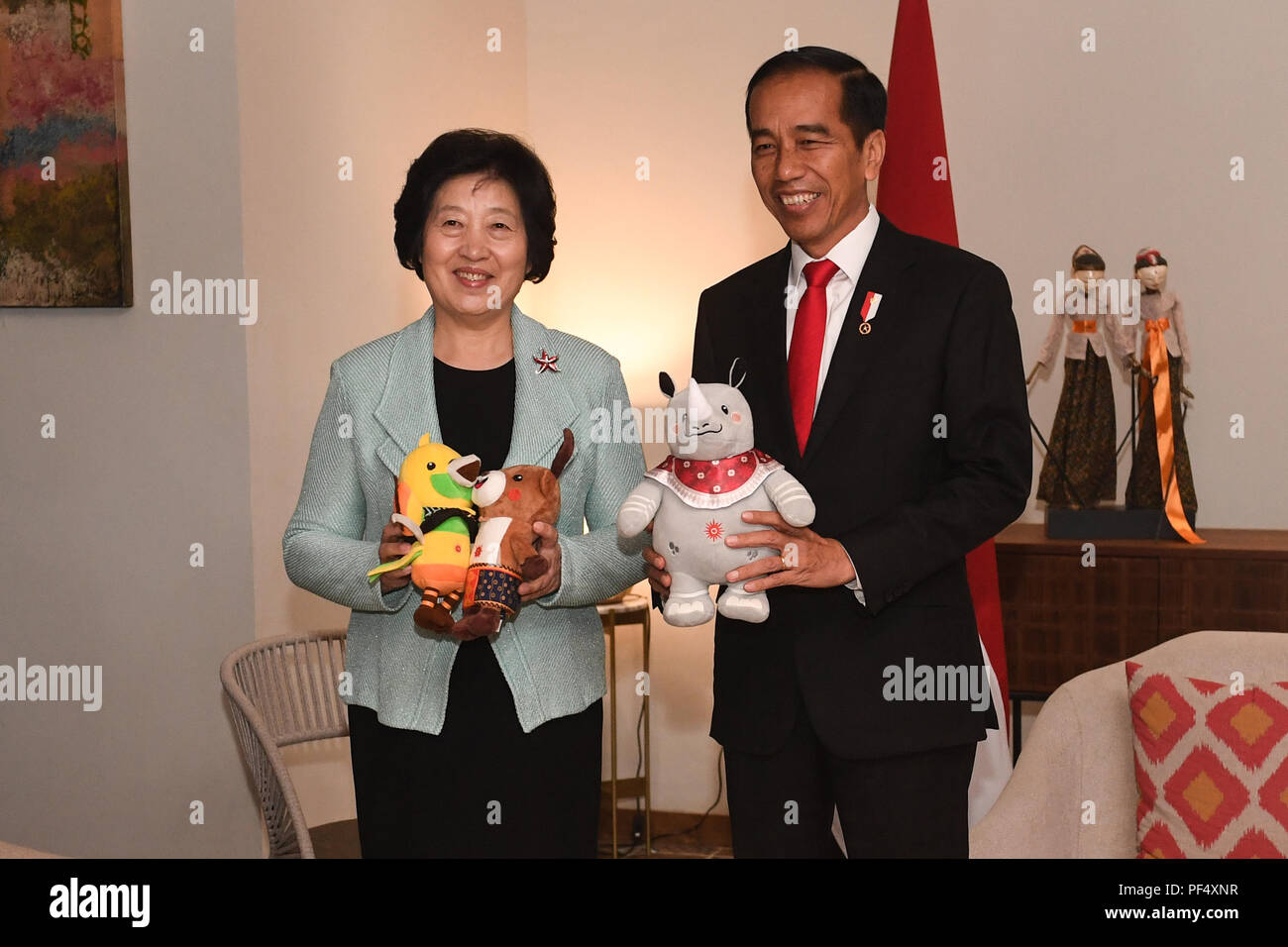 Jakarta, Indonesia. 18th Aug, 2018. Indonesian President Joko Widodo (R ...
