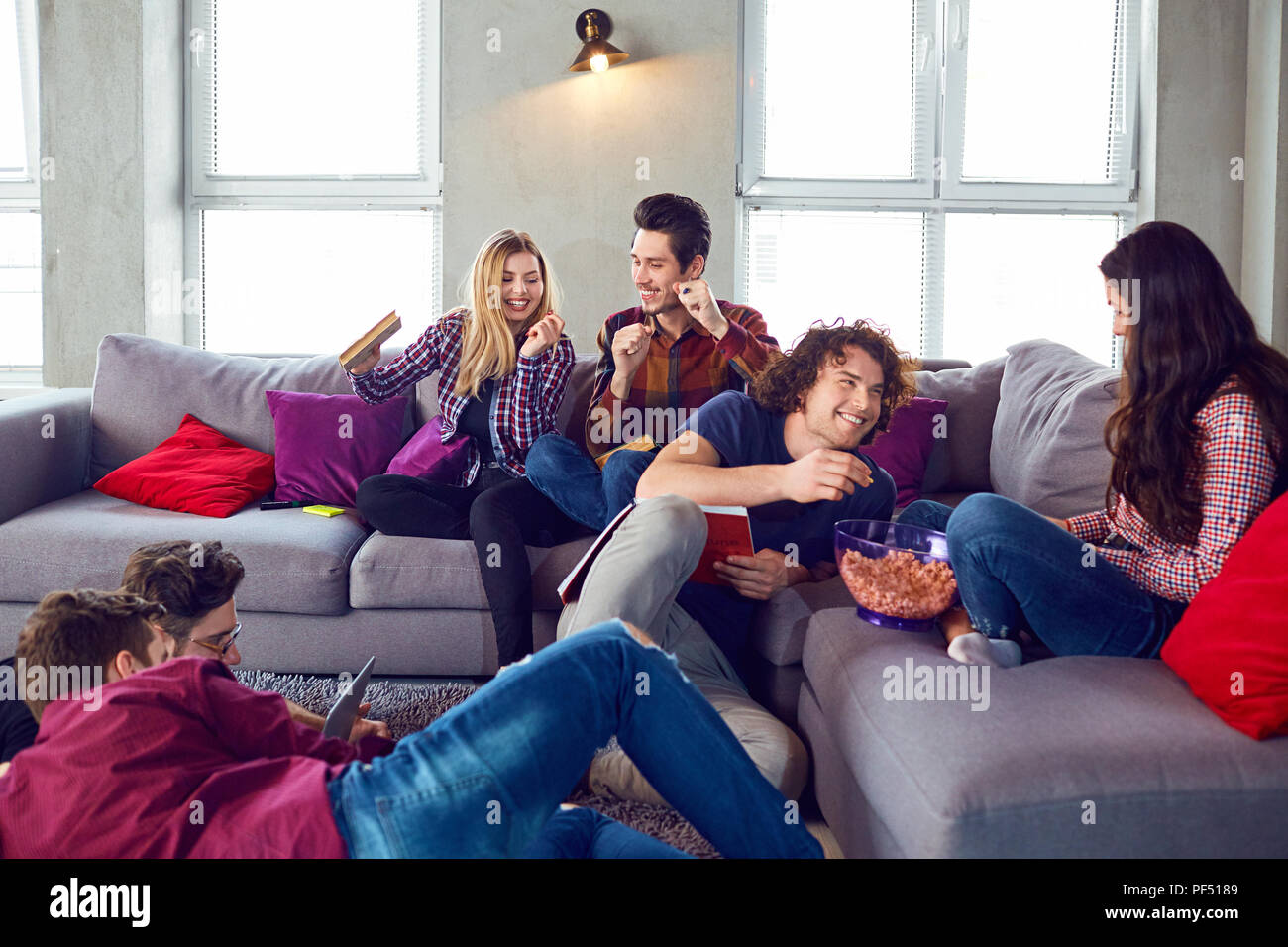 Young people communicate together, in the room Stock Photo - Alamy