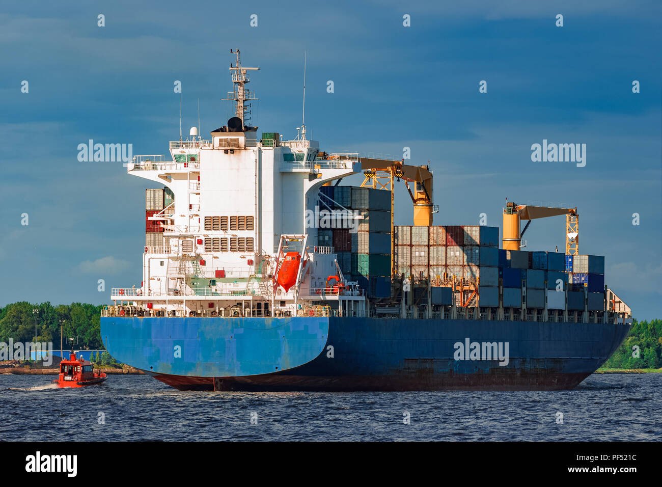 Blue container ship. World logistics and production transfer Stock ...