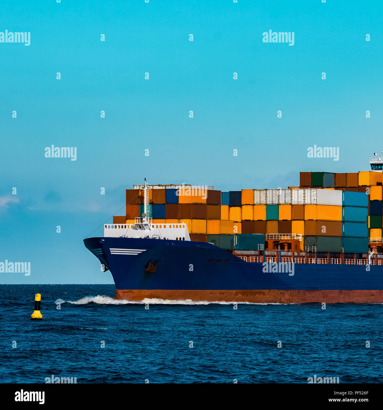 Blue container ship in travel. Logistics and freight industry Stock ...