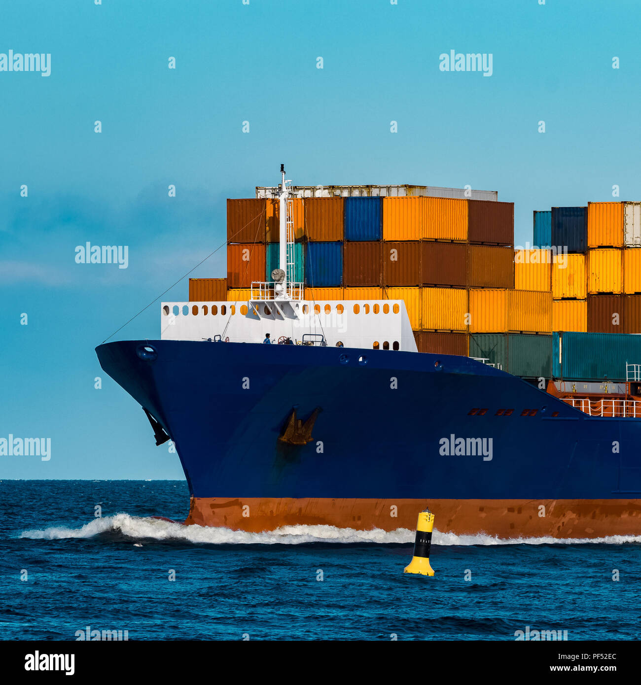 Blue container ship in travel. Logistics and freight industry Stock ...