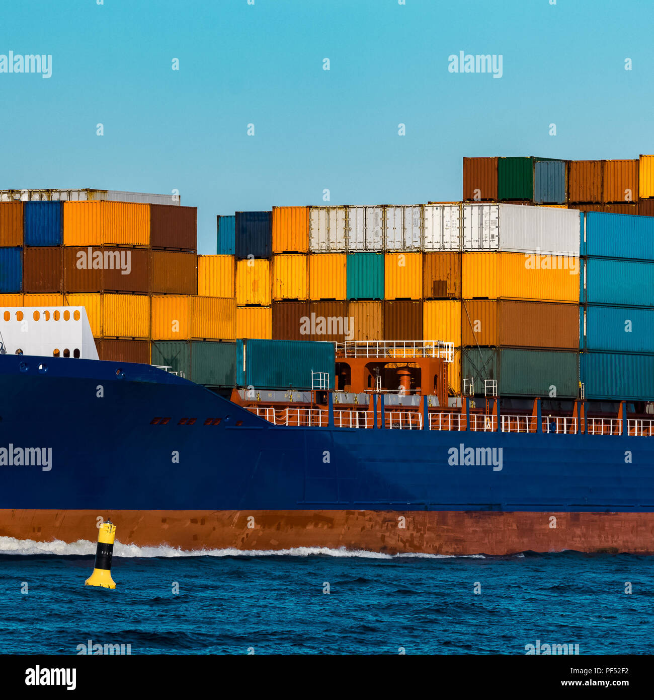Blue container ship in travel. Logistics and freight industry Stock ...