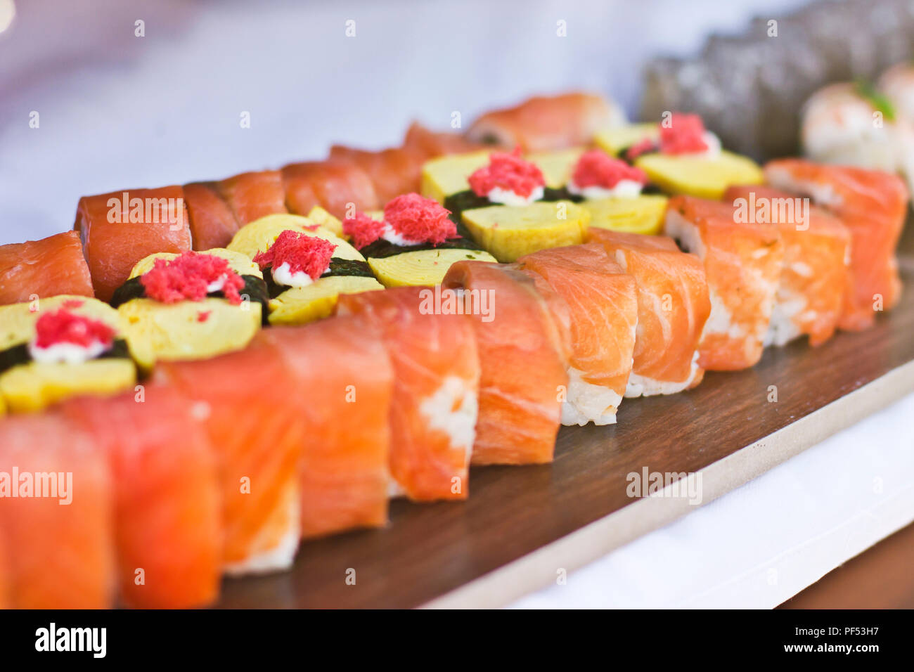 Asian cuisine. Sushi, rolls and sashimi at hotel buffet Stock Photo - Alamy