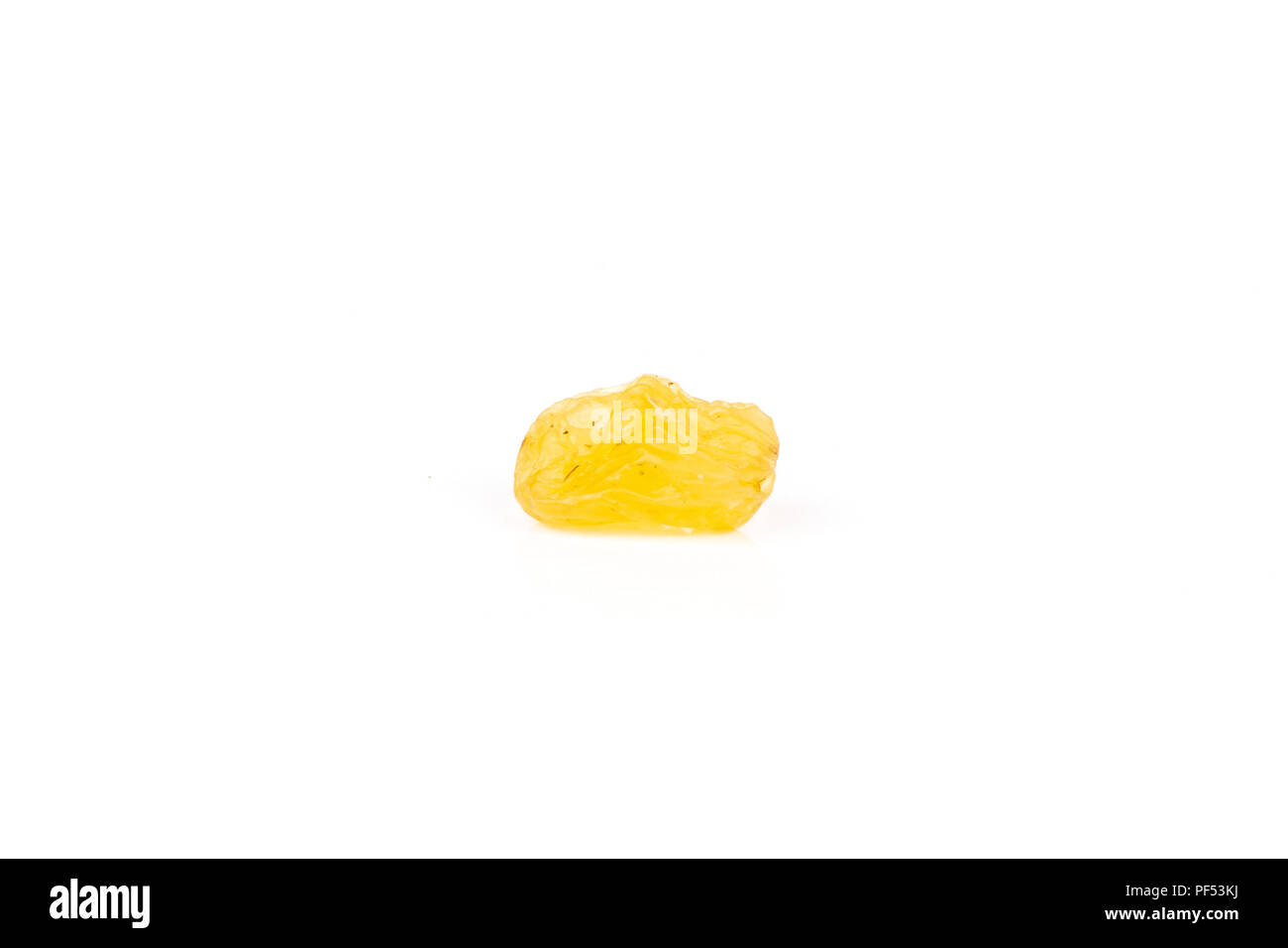 One whole dry golden raisins sultana variety isolated on white ...