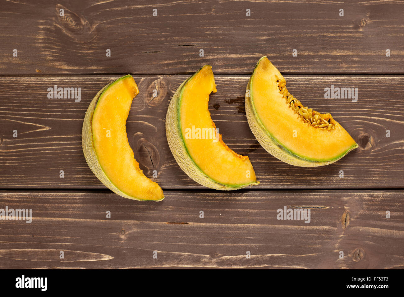 Three slices fresh spanspek cantaloupe hi-res stock photography and ...