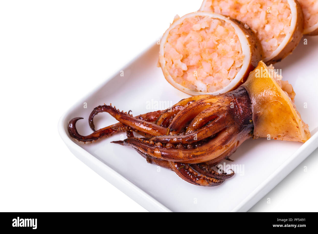 stuffed squid chopped rings on a white isolated background Stock Photo ...