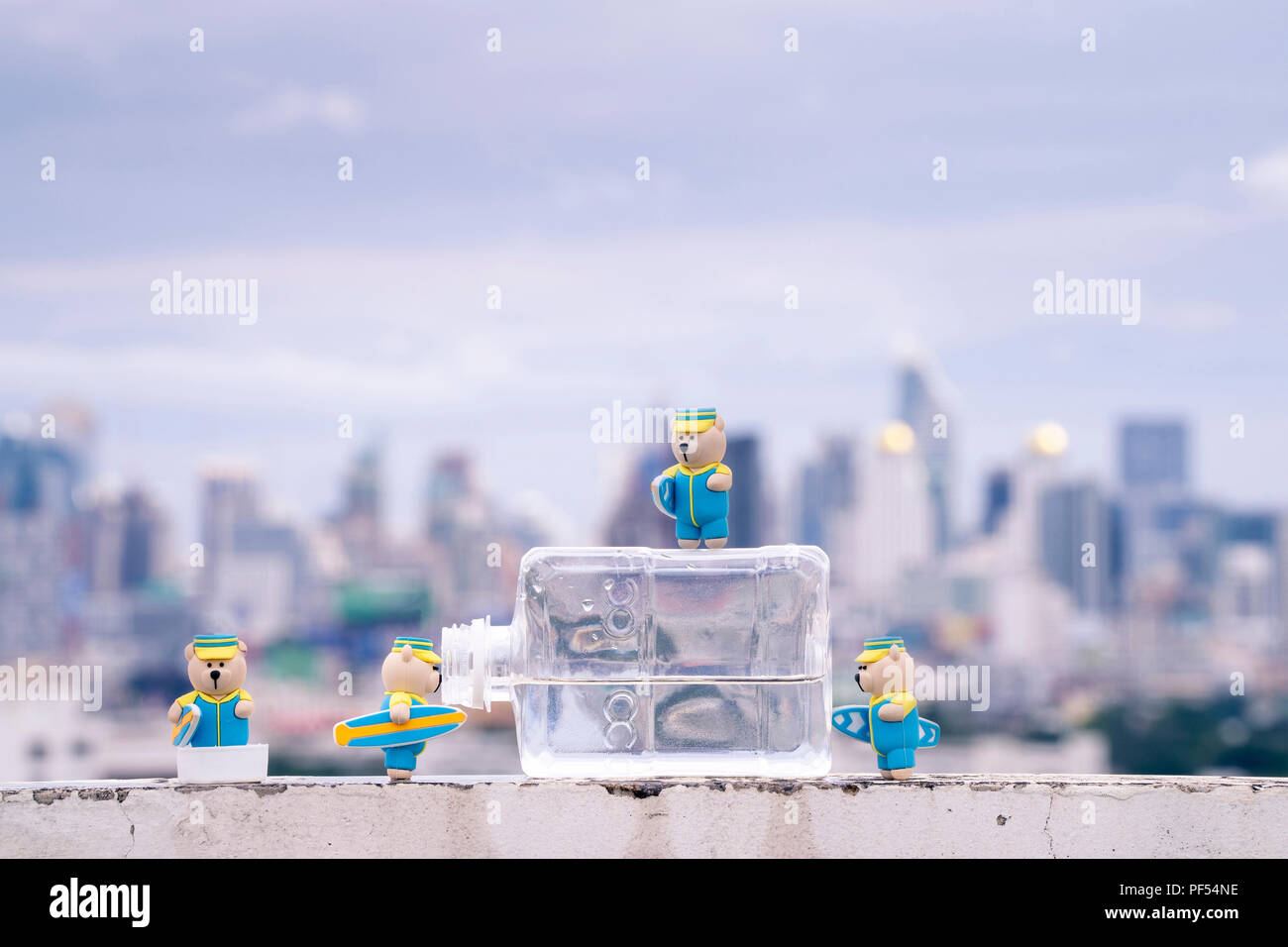 Little bear is saving the water Stock Photo - Alamy