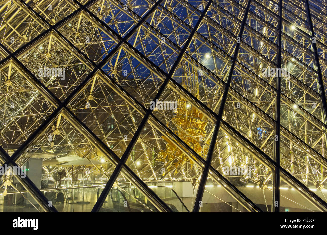 PARIS, FRANCE- JULY 27, 2018: Close up of the Louvre glass roof with ...