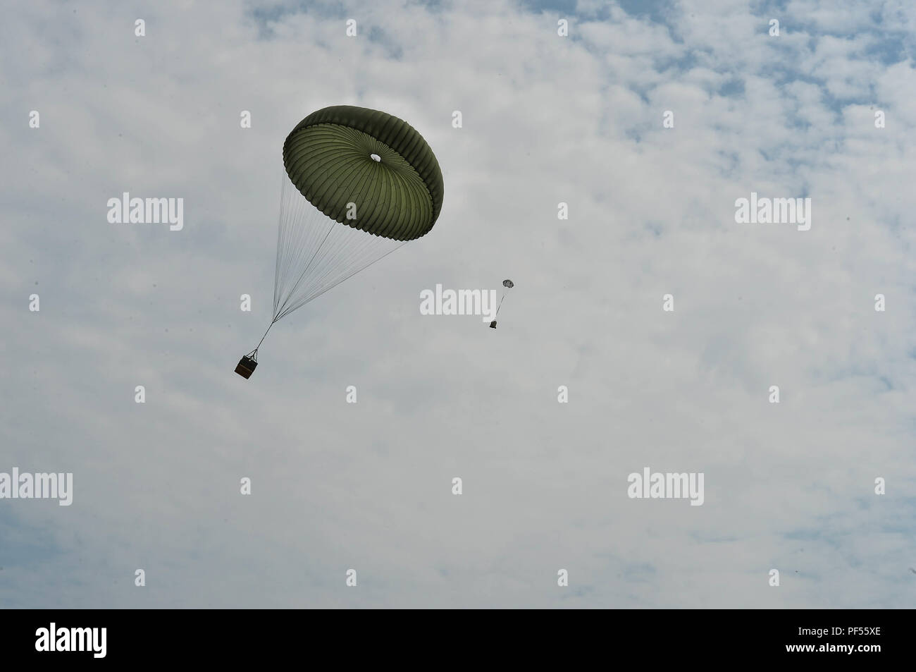 Airdropped container delivery packages descend upon Powidz Air Base ...