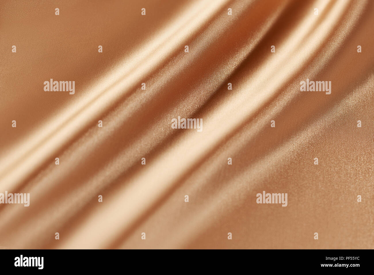 Smooth elegant golden silk or satin luxury cloth. Luxurious background ...