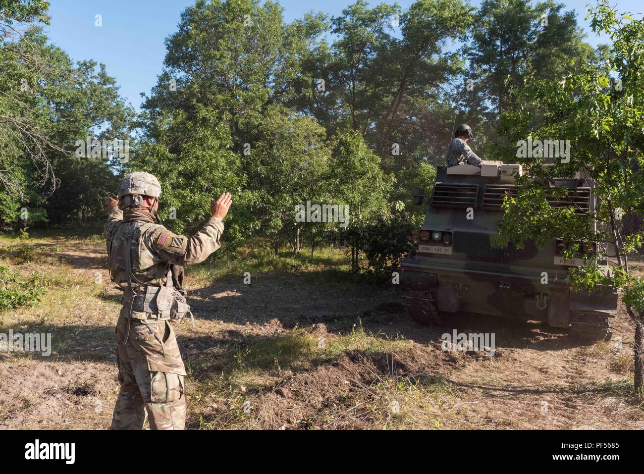 CAMP GRAYLING, Mich. - Staff Sgt. Derrick Mehlhaf, crew chief, B ...