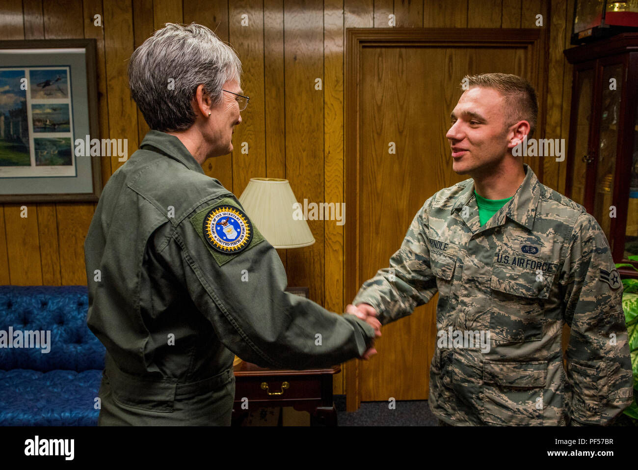 U.S. Secretary of the Air Force Heather Wilson coins Airman 1st Class ...