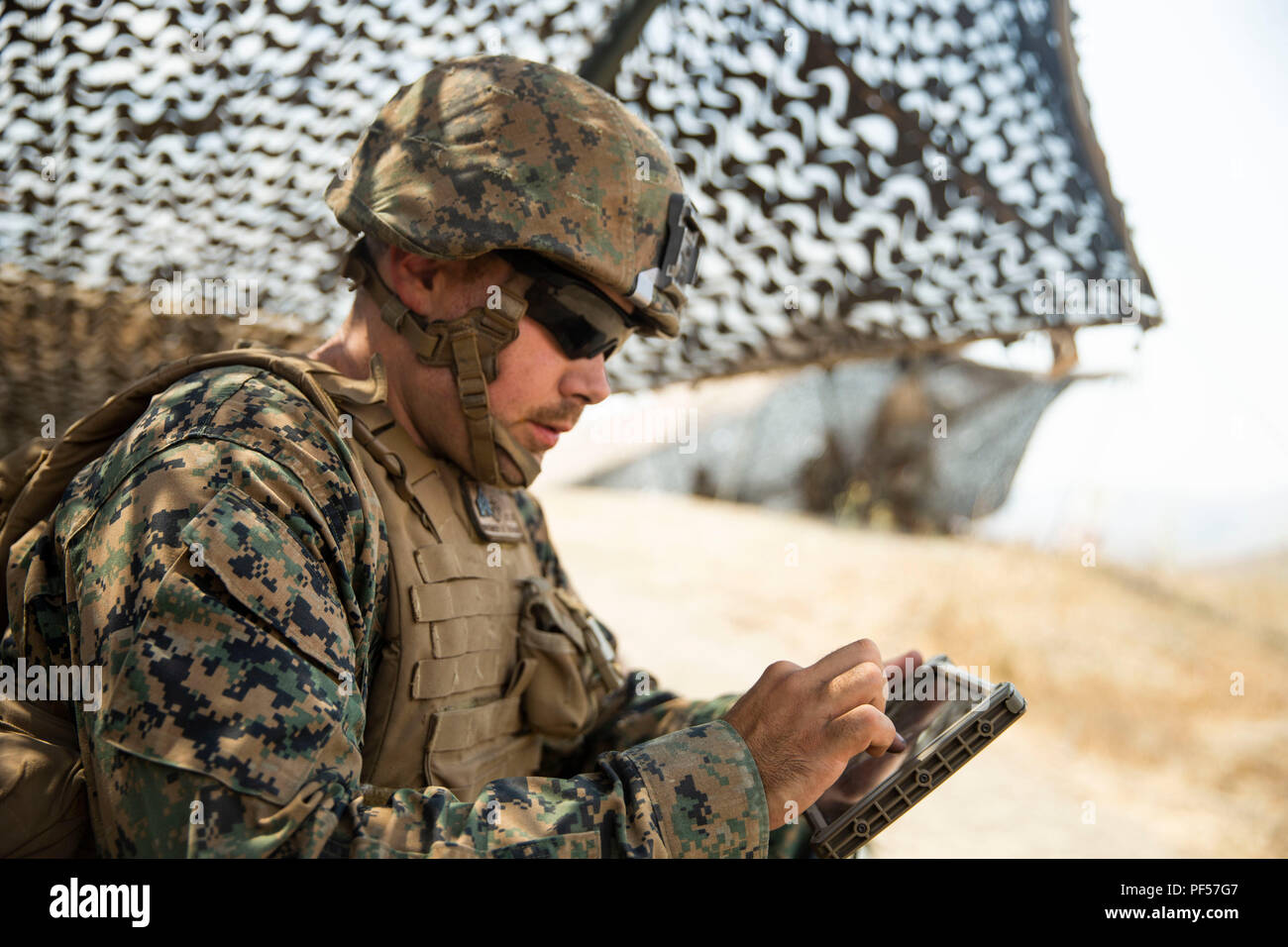 U.S. Marine Corps Sgt. Rob Whittaker, a forward observer with 2nd ...