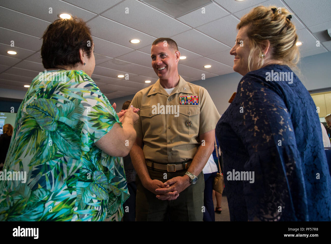 U.S. Marine Corps Col. Jeffrey Holt, center, deputy commander, Marine ...