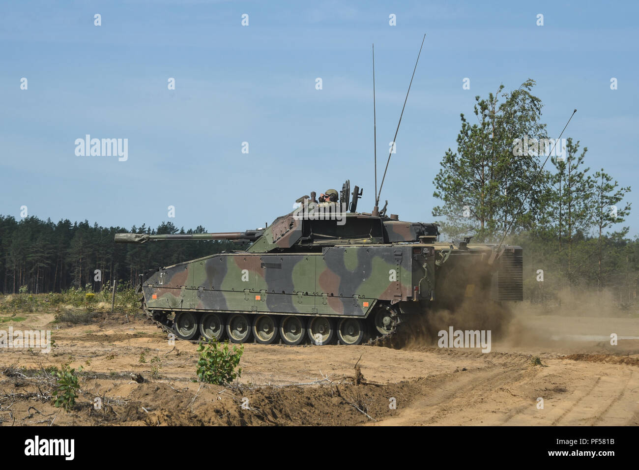 Soldiers with the Royal Netherlands Army maneuver a CV90 infantry ...