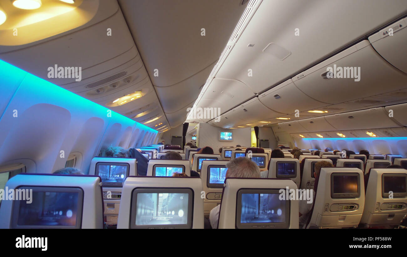 Interior Airplane Passengers On Seats High Resolution Stock Photography ...