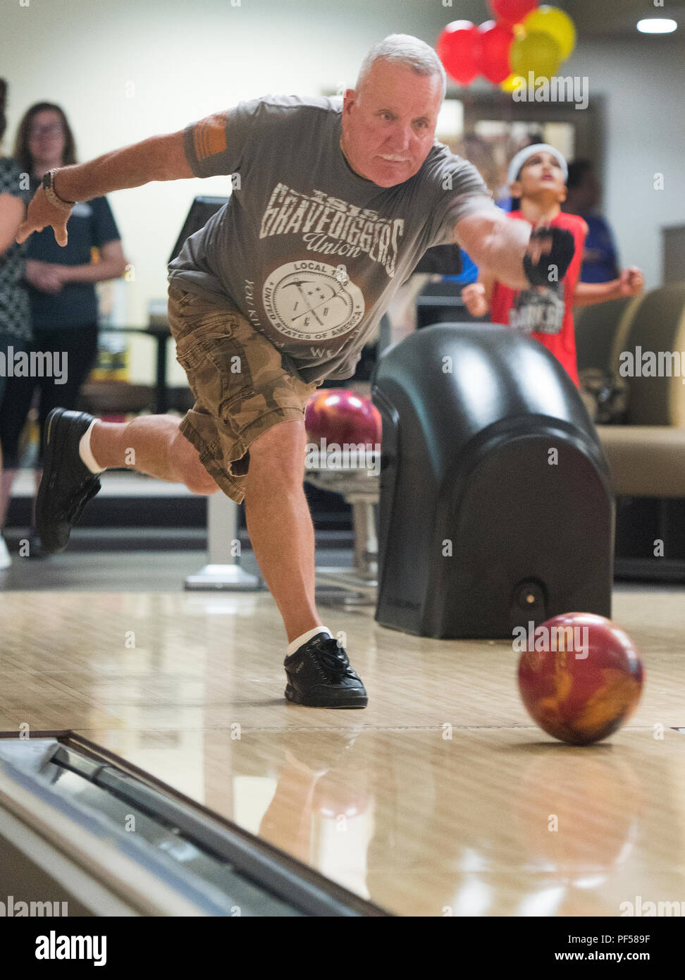 Bud Hanson bowls a frame in the Wright-Patterson Air Force Base, Ohio ...