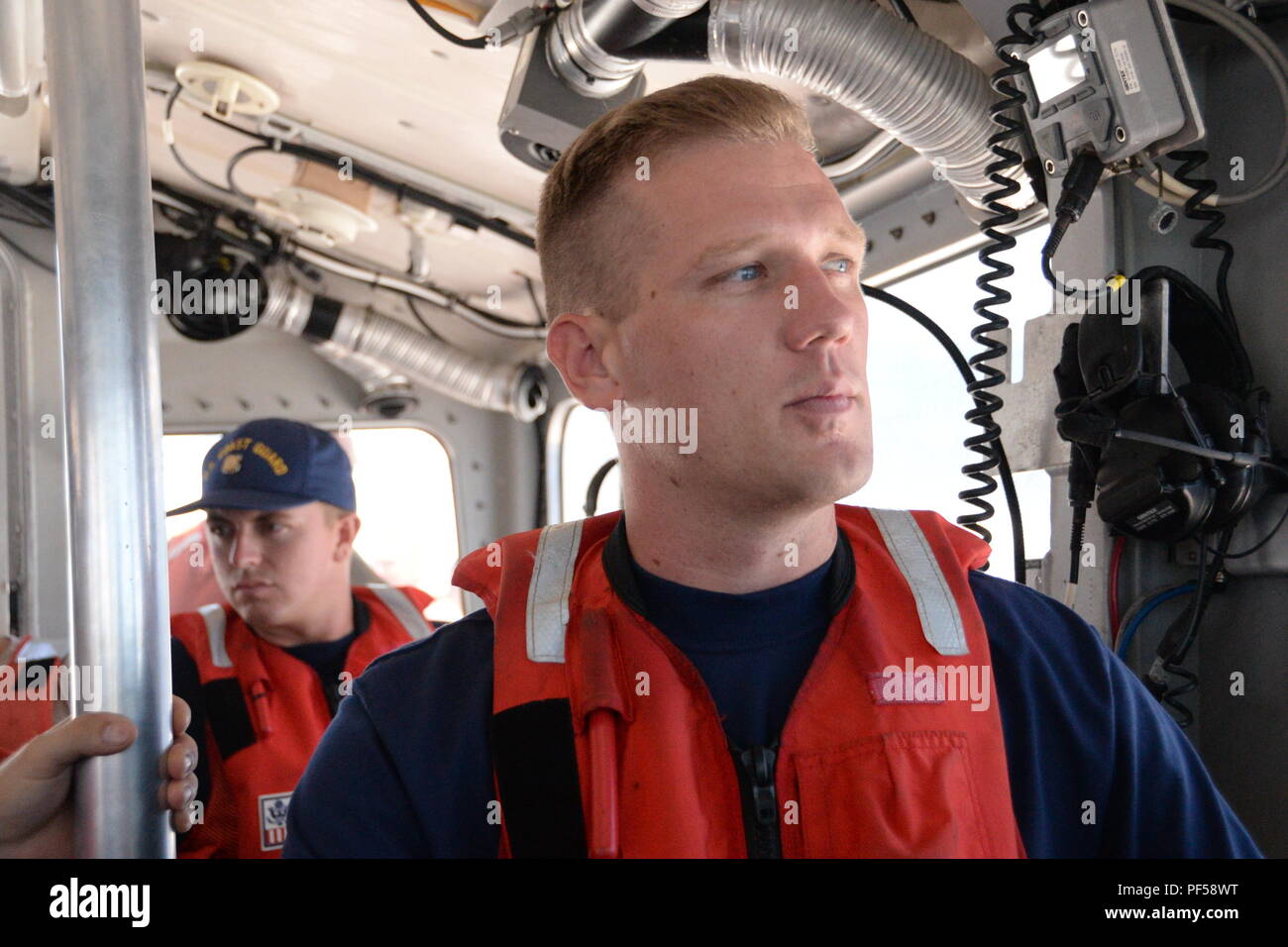U.S. Coast Guard Petty Officer 2nd Class Grant Hadley, a boatswain mate ...