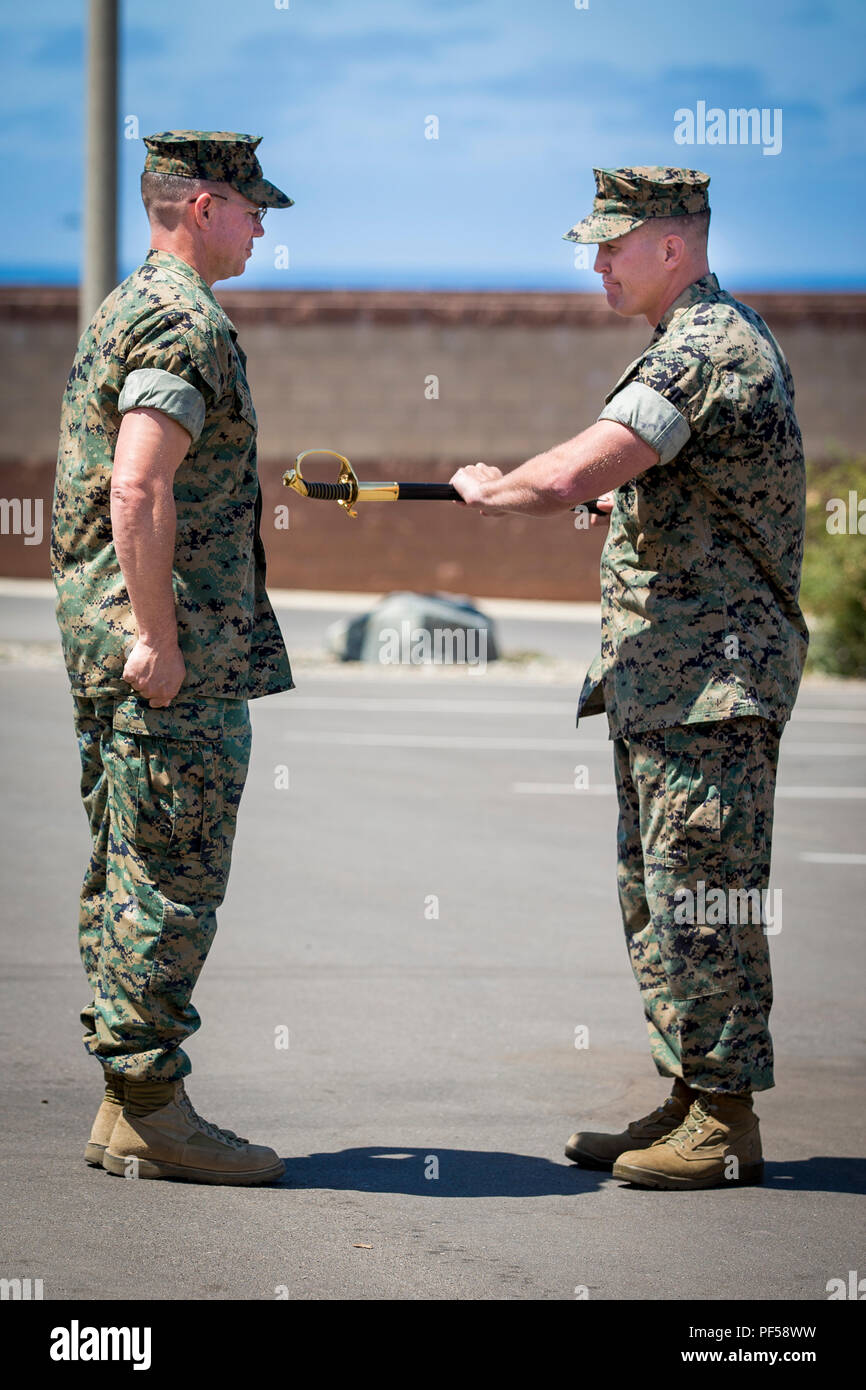 U.S. Marine Corps Sgt. Maj. Bryan L. Marzzarella, right, outgoing ...