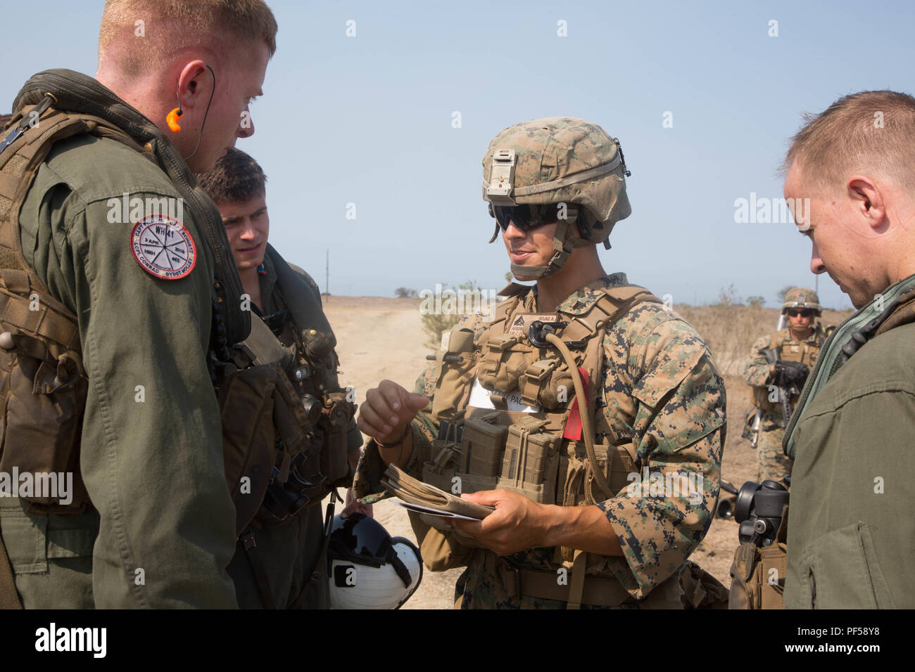 Capt. David Skaggs, left, a CH-53E Super Stallion pilot with Marine ...