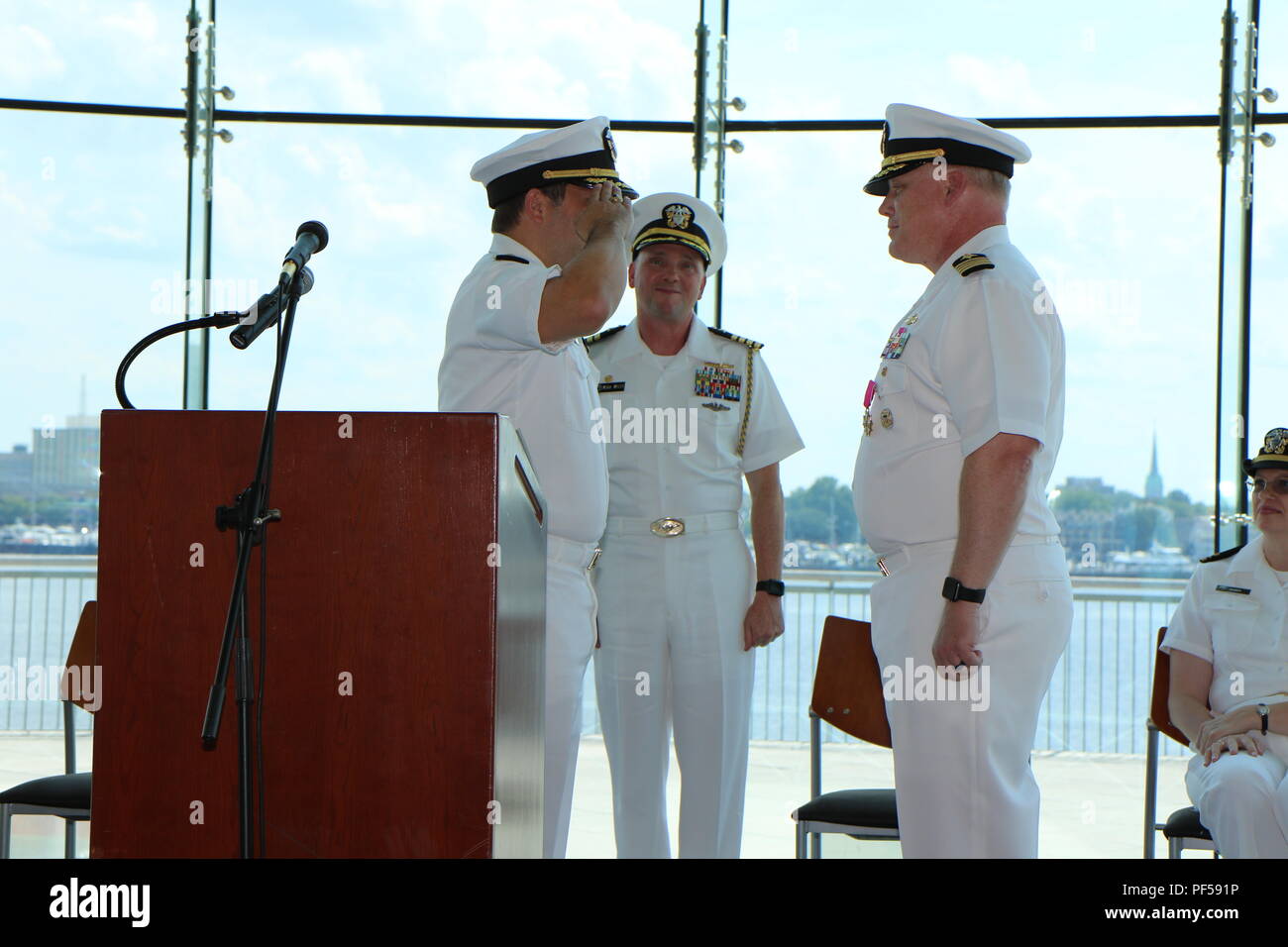 Capt. John H. Ferguson (left) relieves Capt. Stephen S. Erb (right) as ...