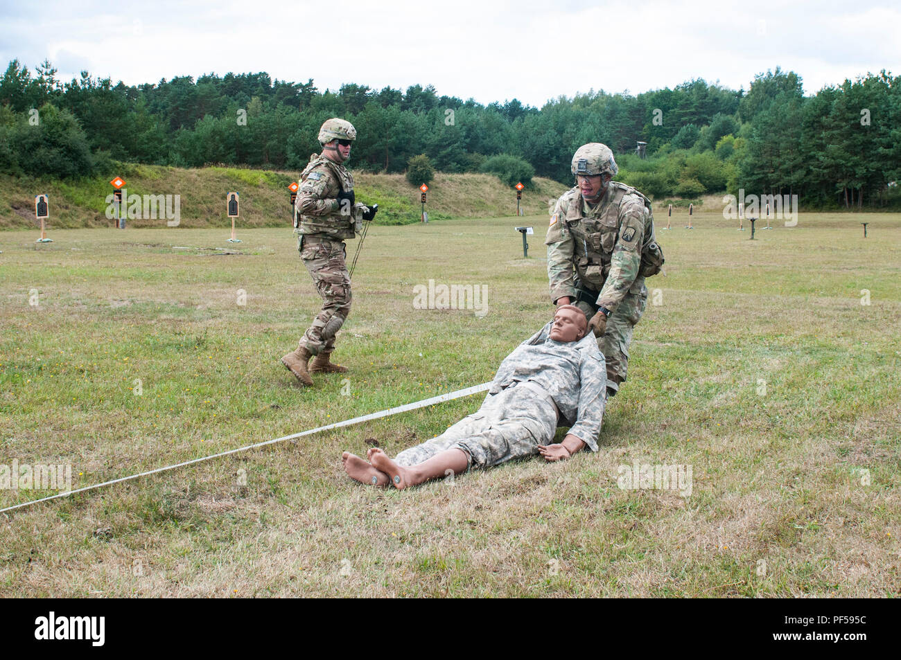 Sgt. Xavier Perkins, 21st Theater Sustainment Command evacuates a ...