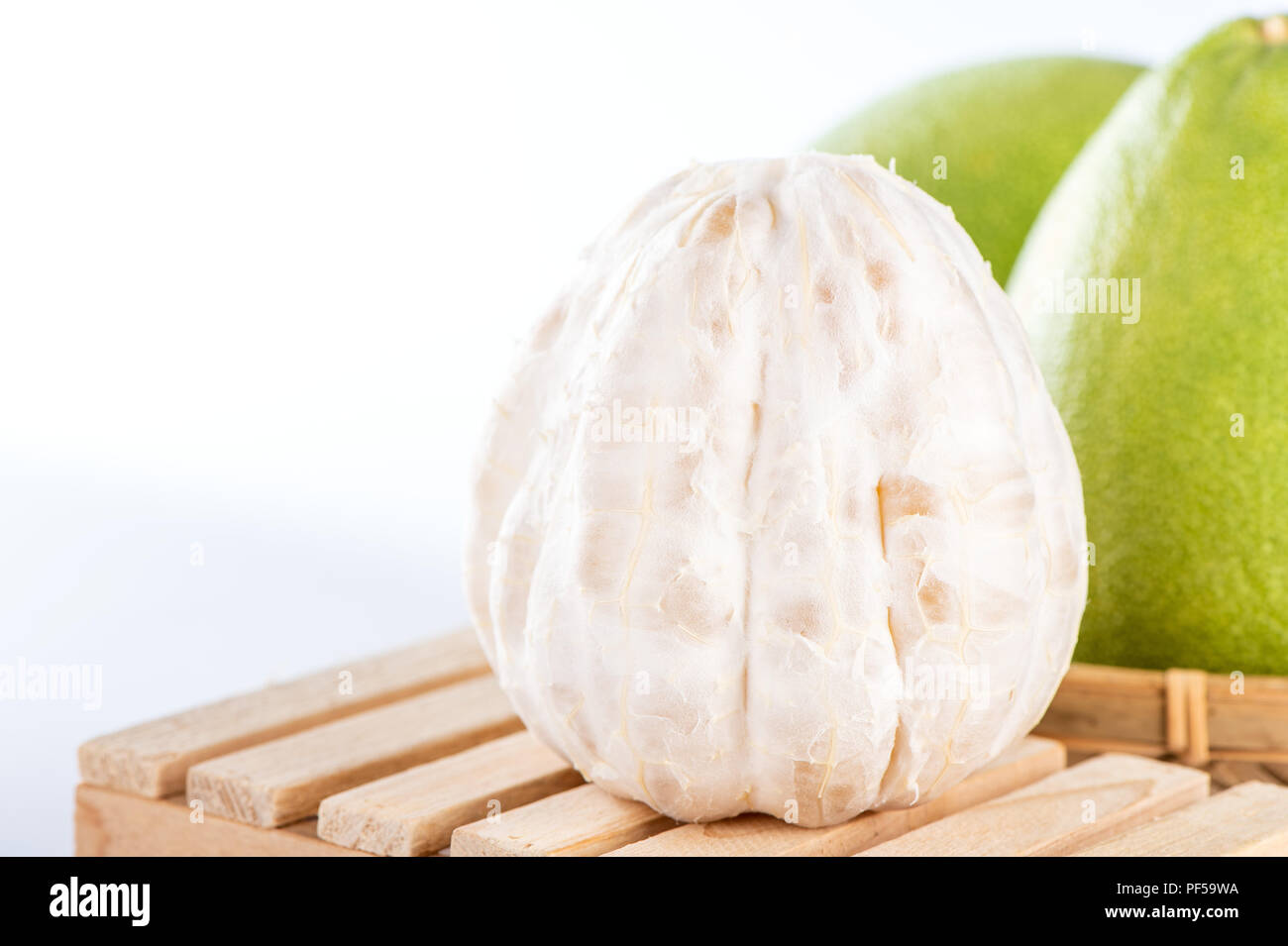 fresh and peeled pomelo(shaddock), grapefruit with slices isolated on ...