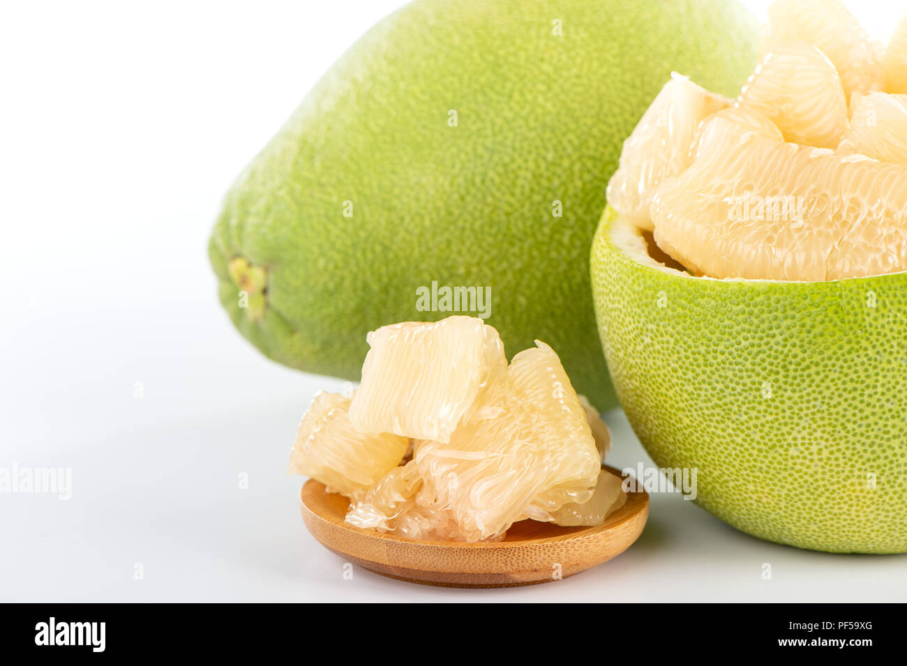 fresh and peeled pomelo(shaddock), grapefruit with slices isolated on ...