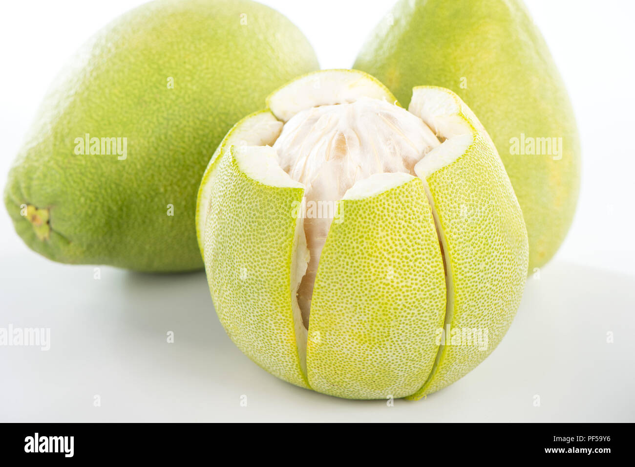 fresh and peeled pomelo(shaddock), grapefruit with slices isolated on ...