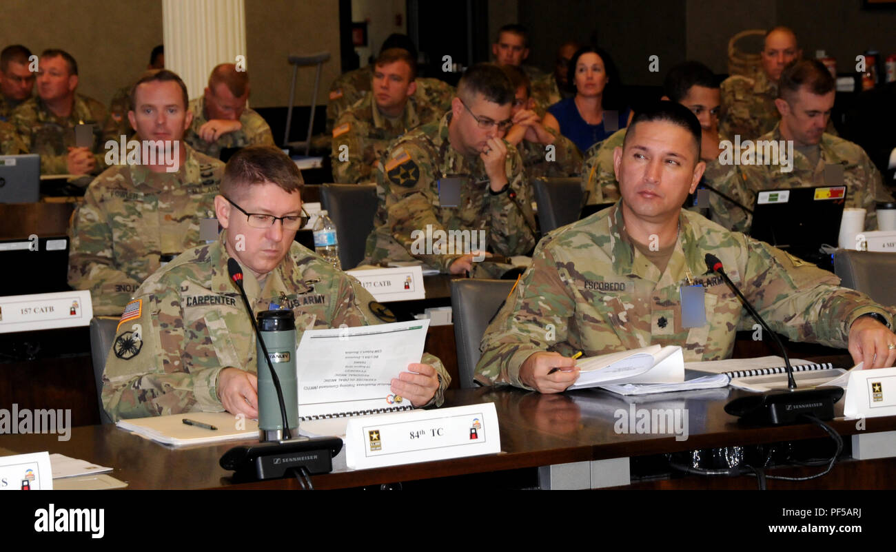 Attendees listen to opening remarks during the First Army Training ...