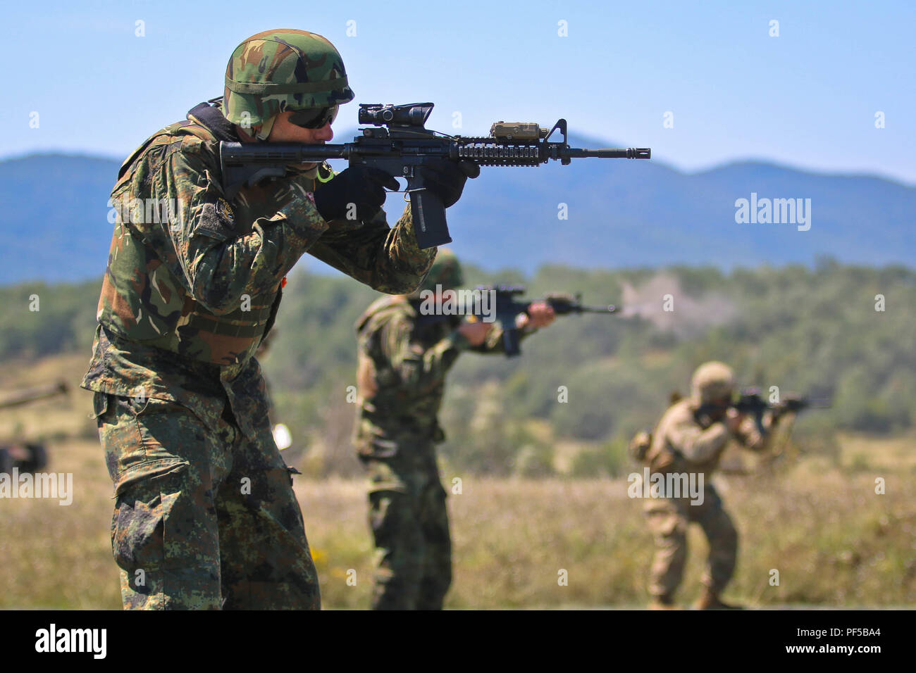 Bulgarian Army Pvt. Dimitar Petrov, first from left, assigned to 42nd ...