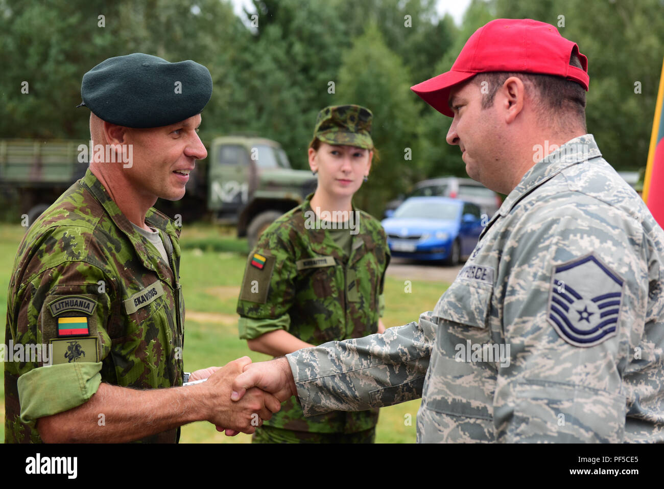 Lithuanian Maj. Kestutis Cekavicius (left), training area commander at ...