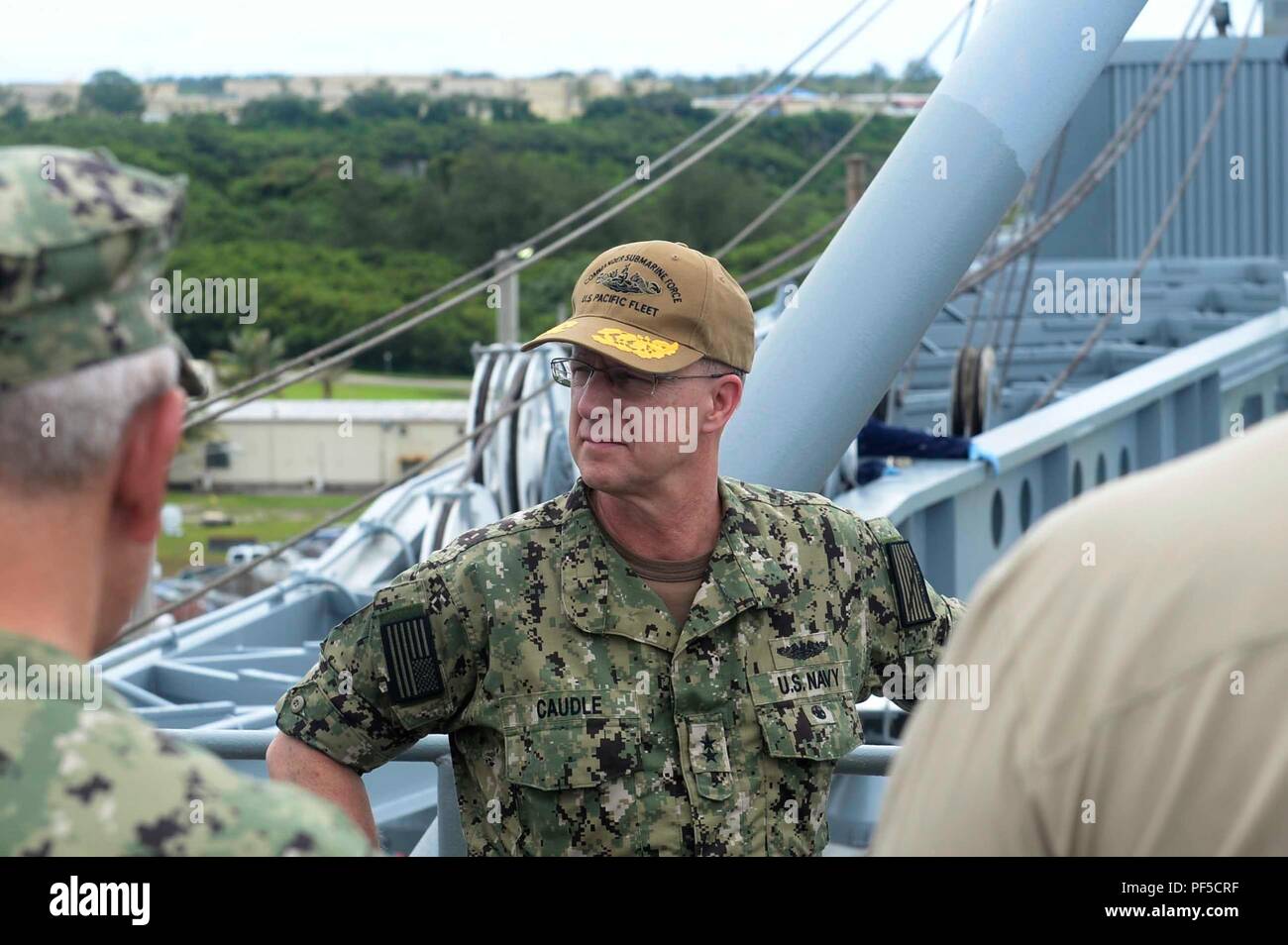 SANTA RITA, Guam (August 15, 2018) - Rear Adm. Daryl Caudle, commander ...
