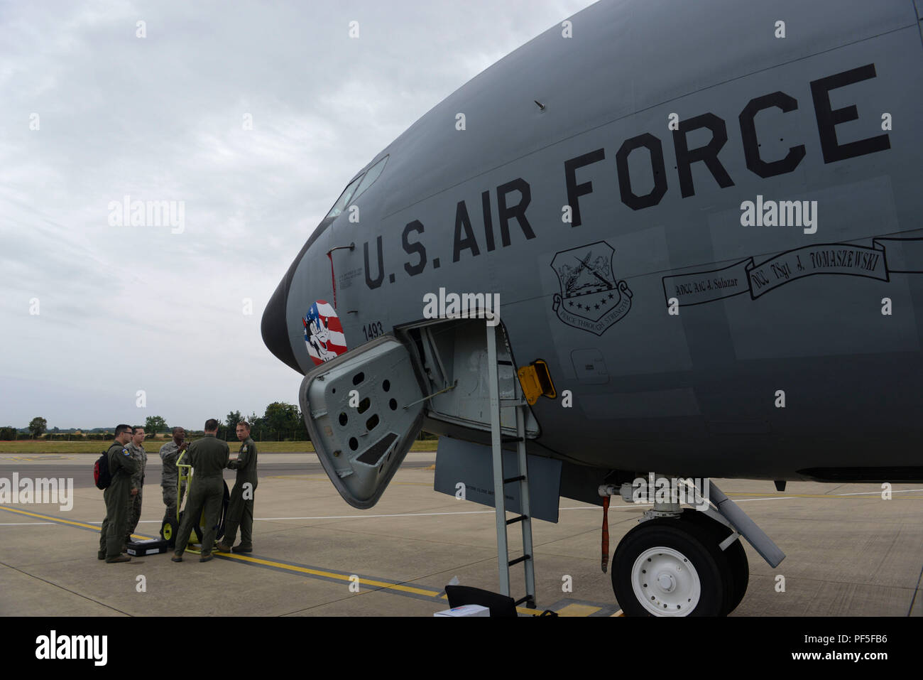 U.S. Air Force Airmen from the 100th Air Refueling Wing review a ...