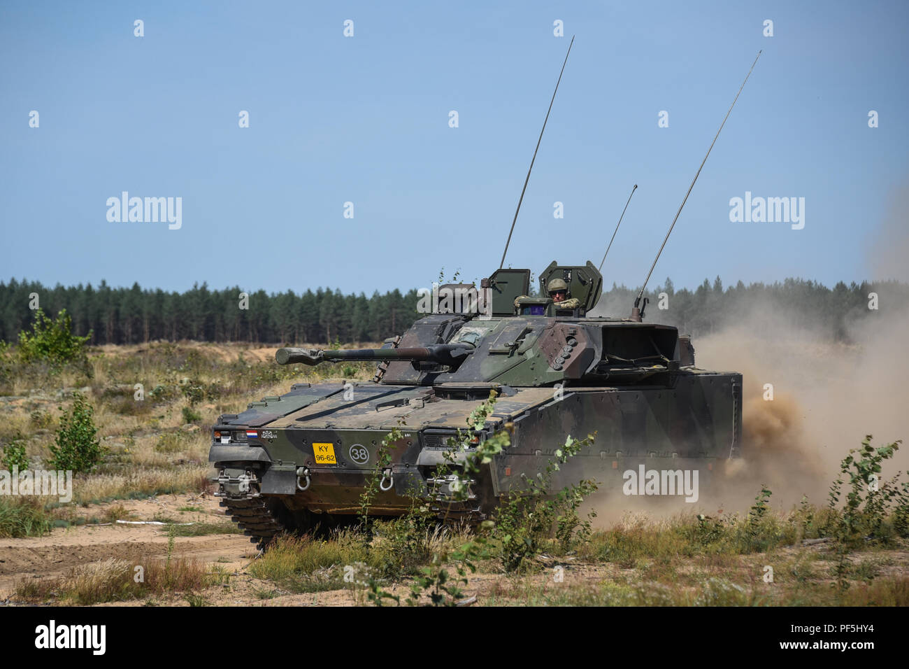 Soldiers with the Royal Netherlands Army maneuver a CV90 infantry ...