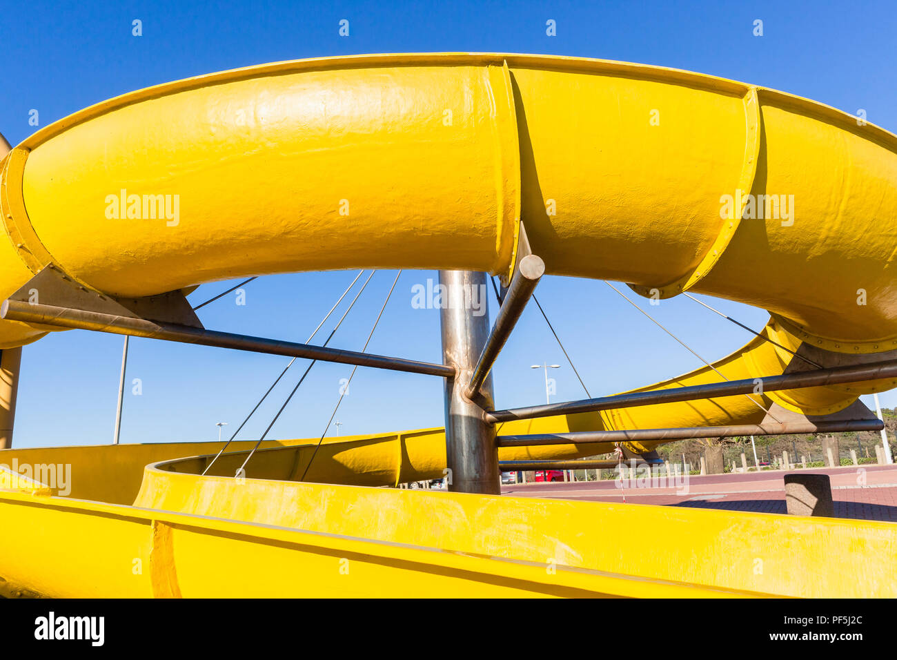 Amusement park yellow water slide structure closeup family holiday ...