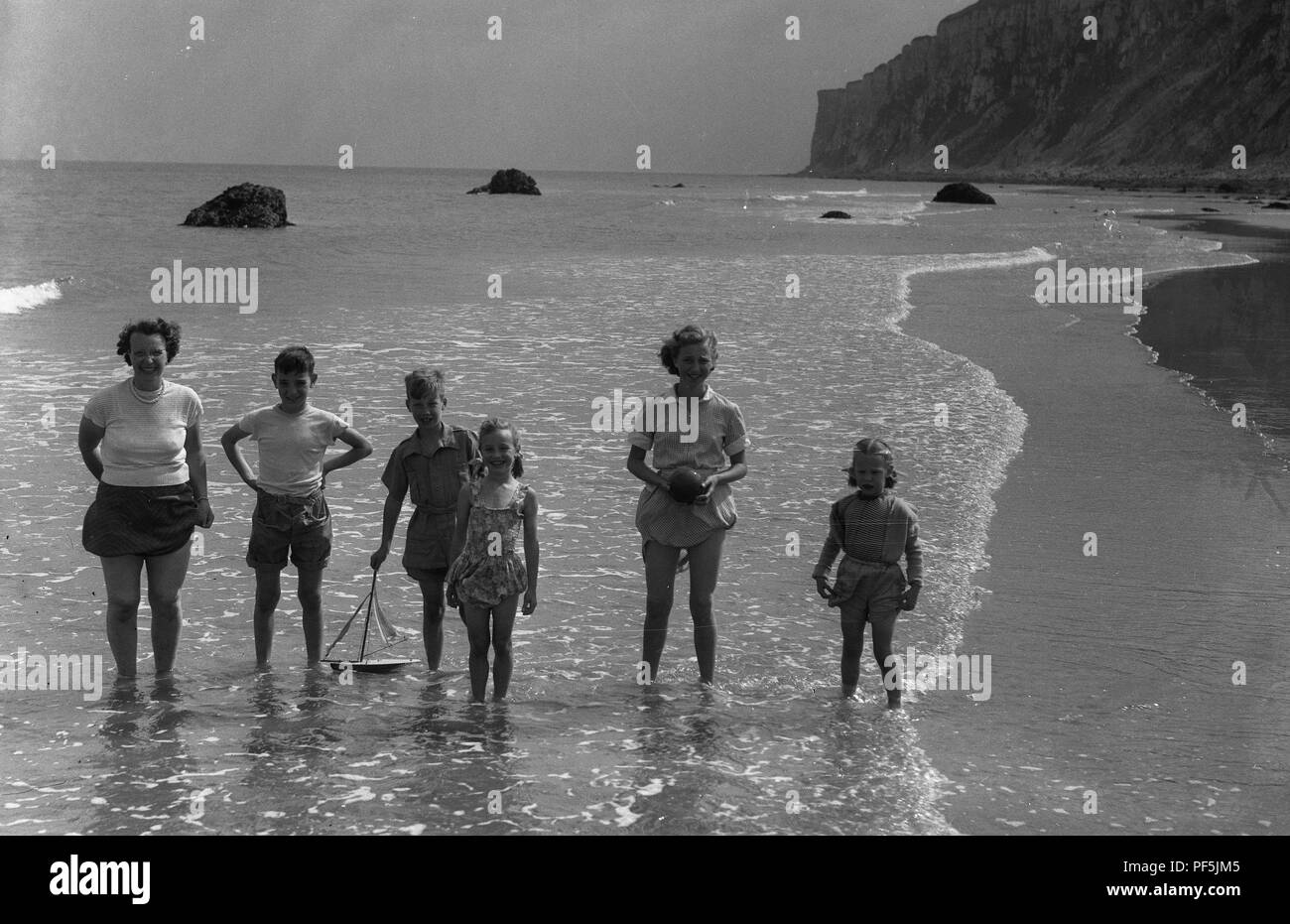 Family at seaside Stock Photo - Alamy