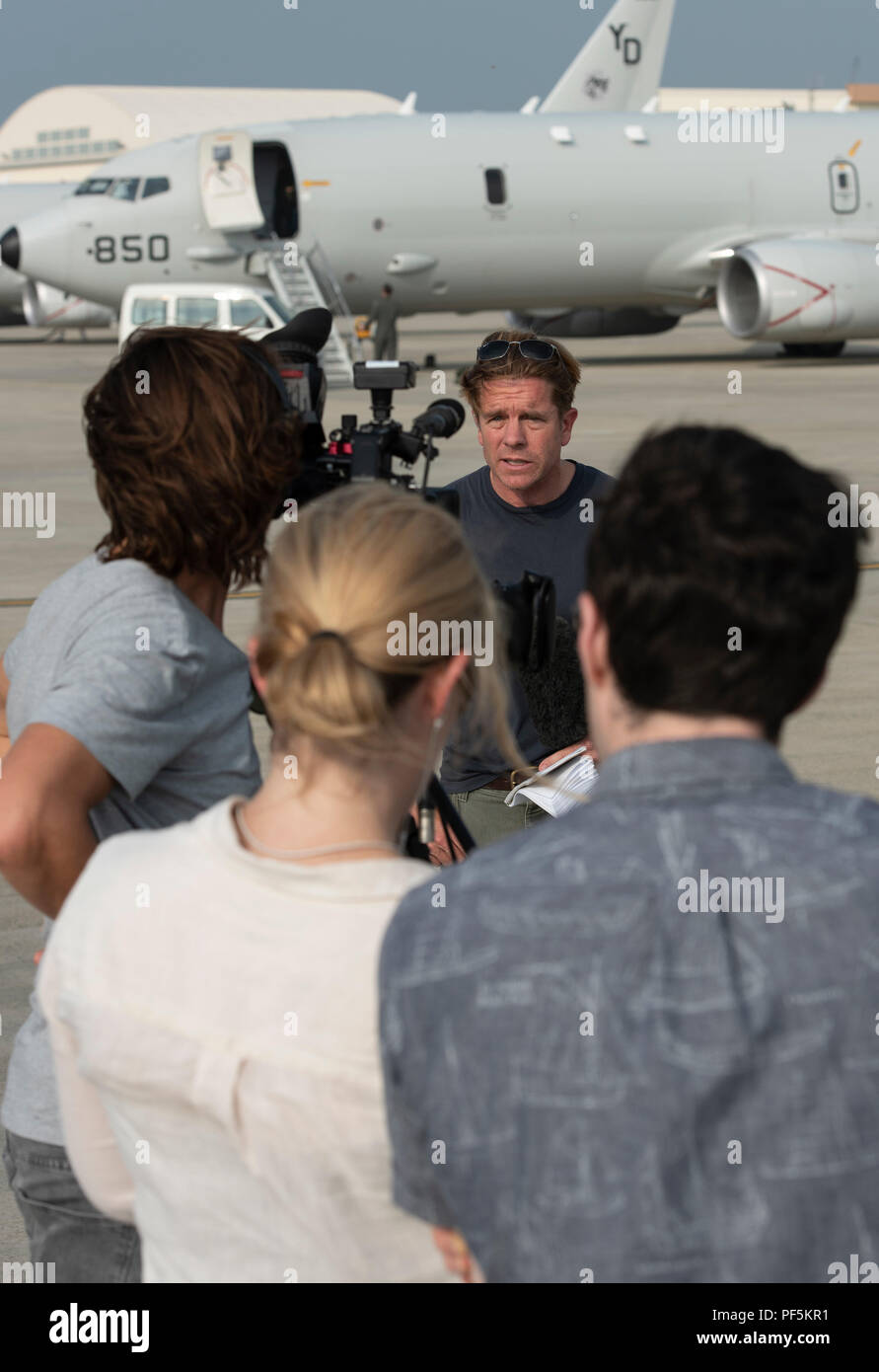 CNN Reporter Ivan Watson airs a live report after a flight on a U.S ...