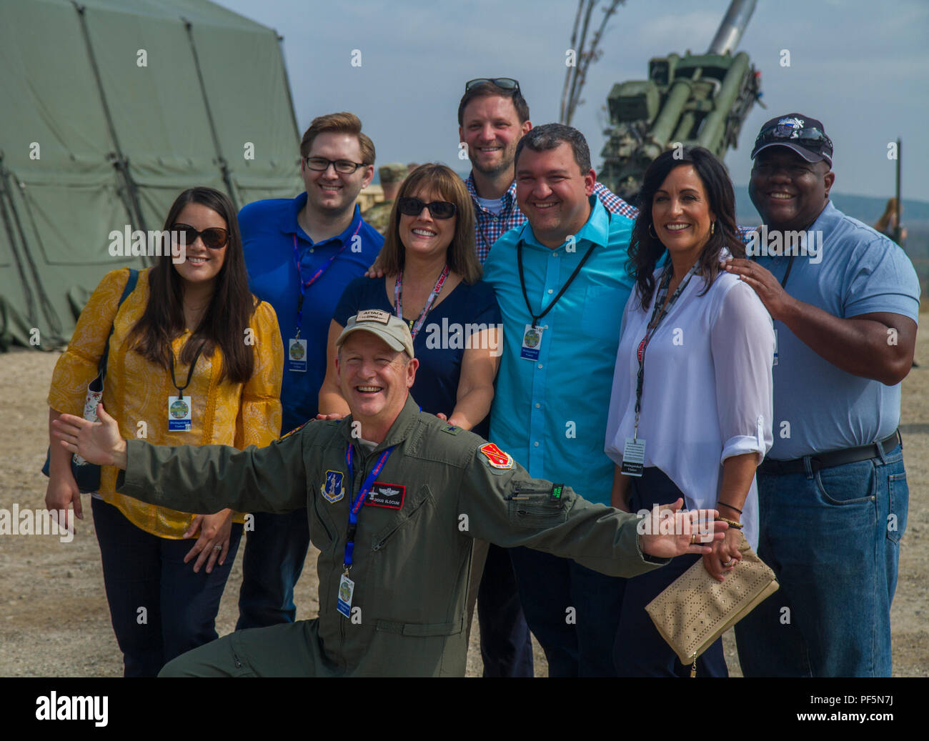 Air Force Brigadier General Doug Slocum poses for a photo with a group ...