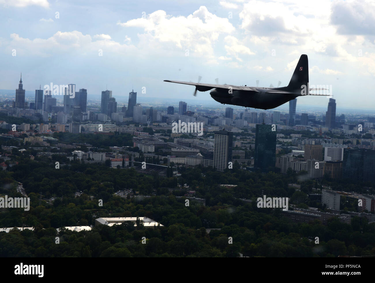 A Polish Air Force C-130E aircraft flies over Warsaw, Poland, during ...