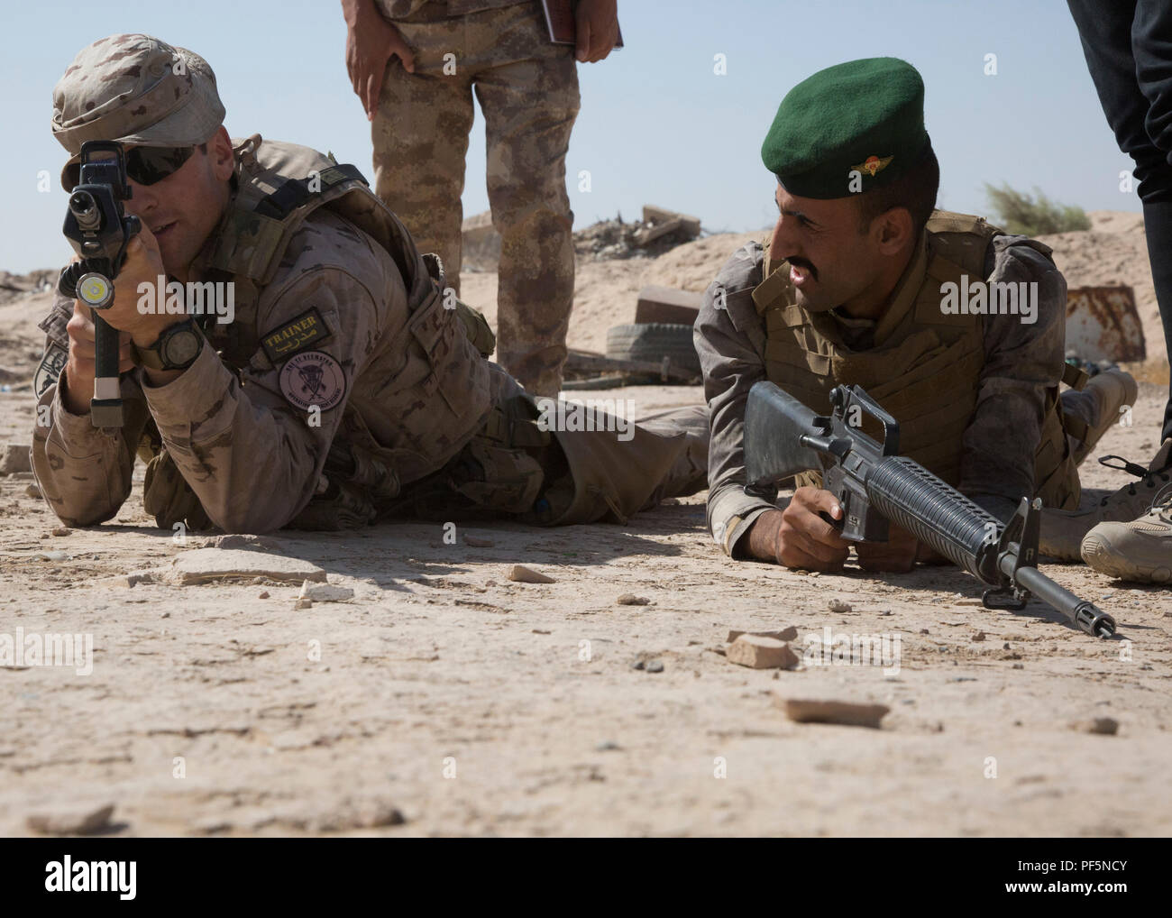 A member of the Spanish army Instructs an Iraqi boarder guard force ...
