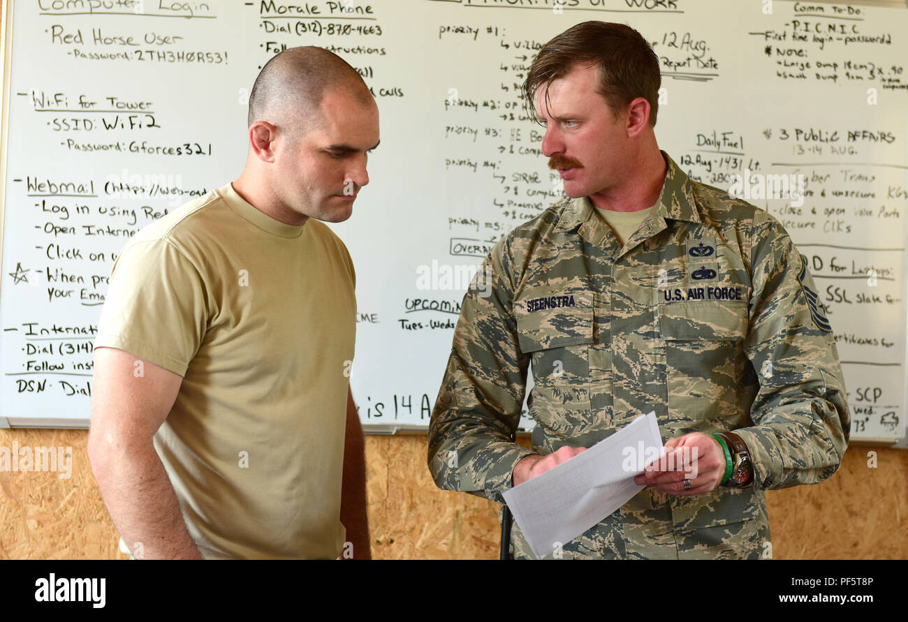 Tech. Sgt. Ken Supsic (left), supply technician with the 201st Rapid ...