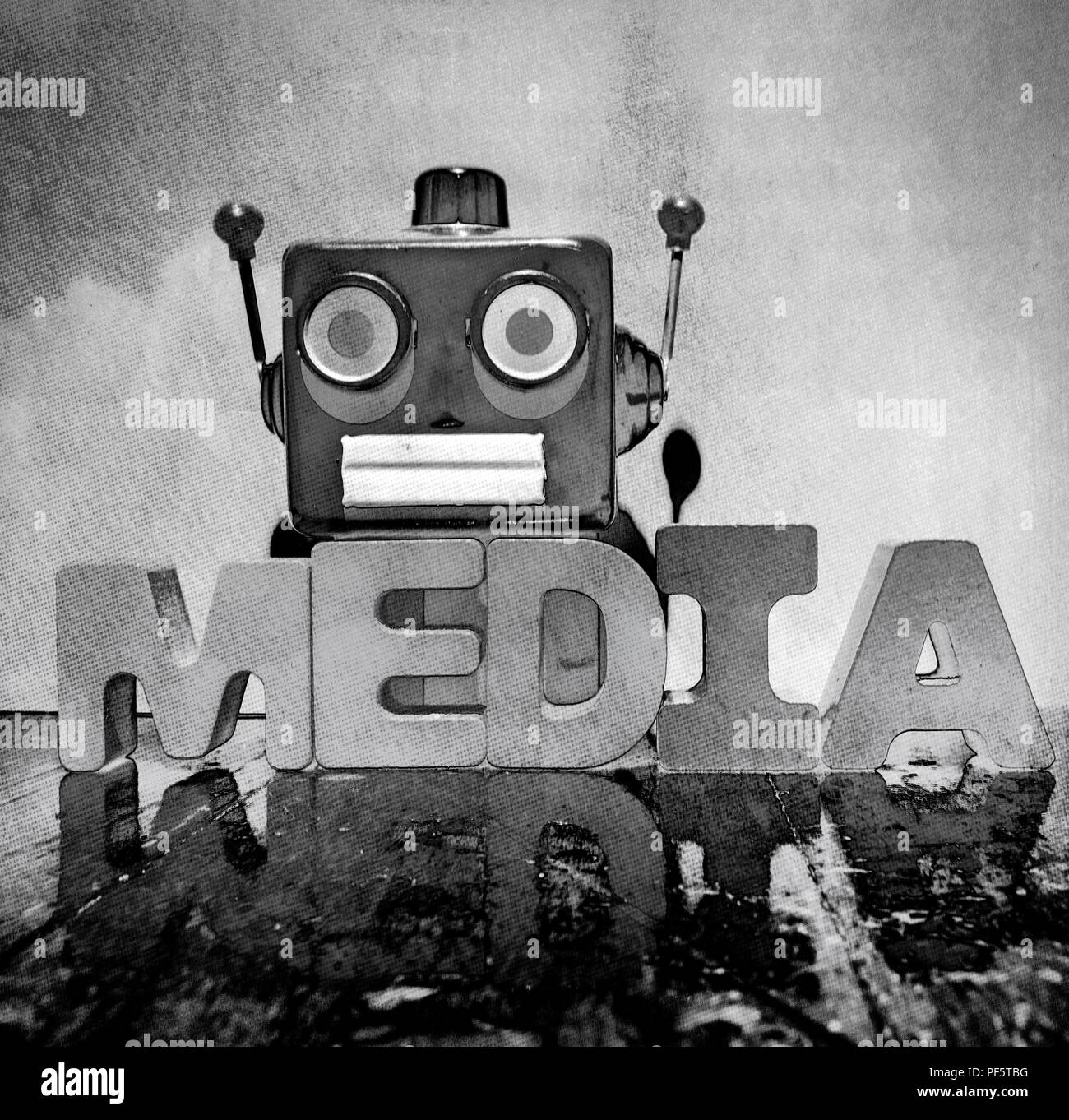 red retro robot head on the word FILE on old wooden flor Stock Photo ...