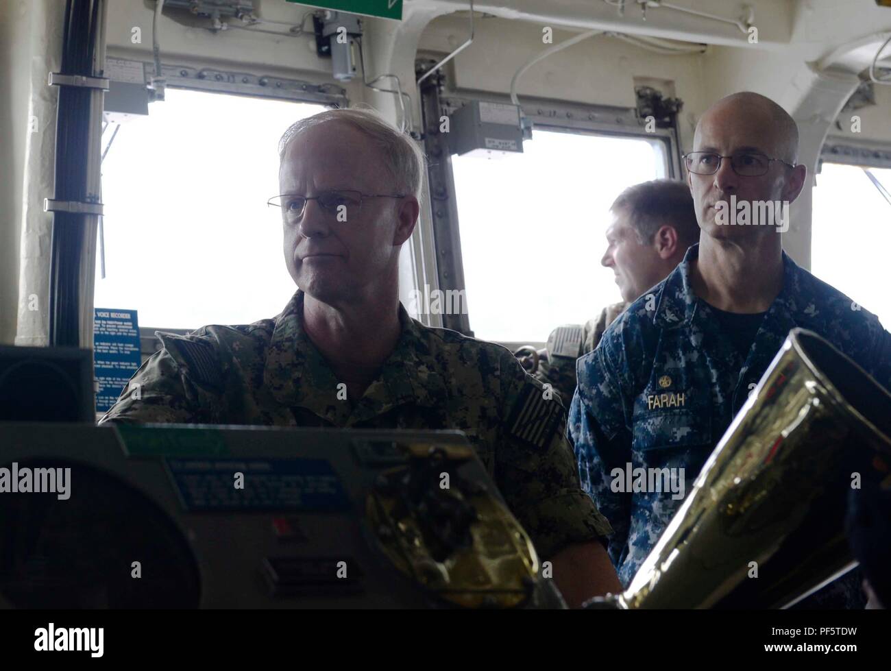 SANTA RITA, Guam (August 15, 2018) - Rear Adm. Daryl Caudle, commander ...