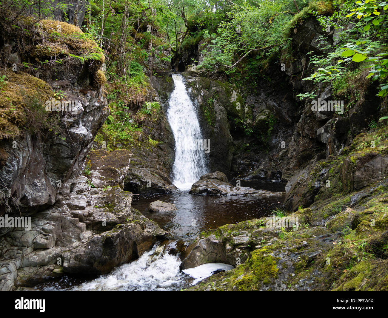 Waterfall from Allt Doe burn into Loch Ness, Scotland, UK Stock Photo ...
